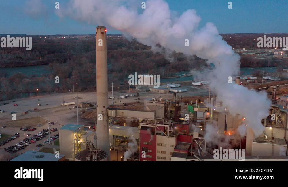 Industrial smokestacks, billowing emissions of smoke or steam Stock ...