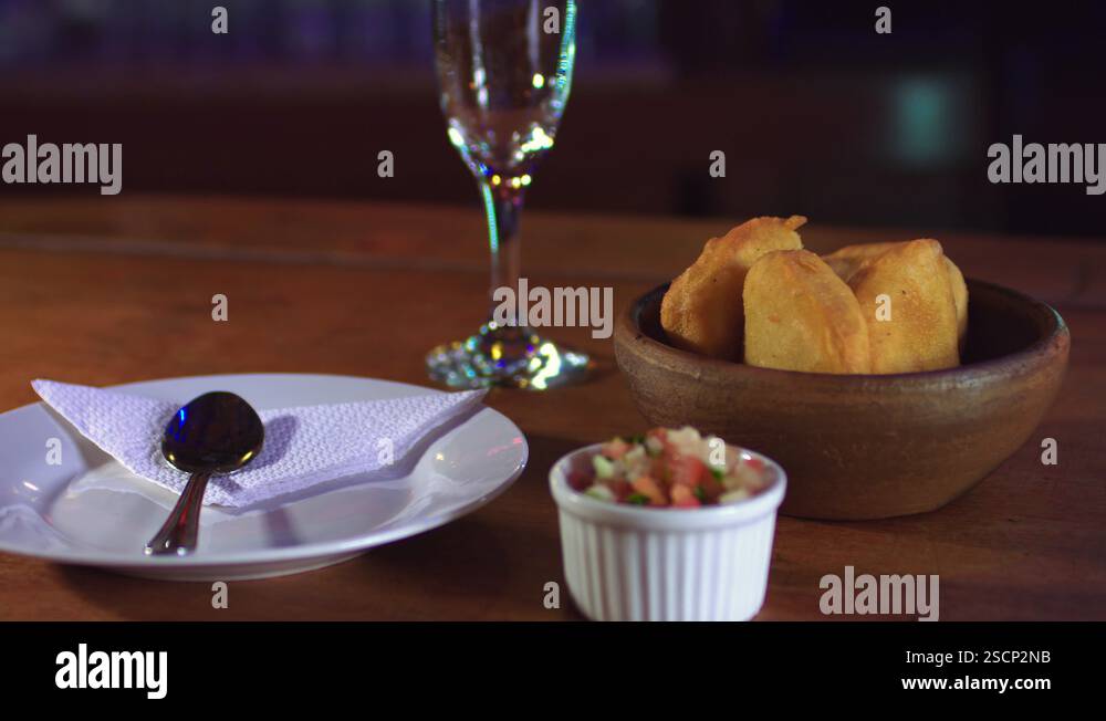 Panning shot to a clay bowl with hot sopaipillas Stock Video Footage ...