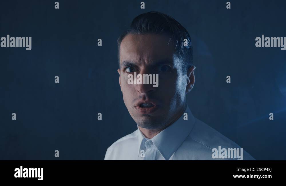 Close-up of angry businessman screaming, showing fear, rage and ...