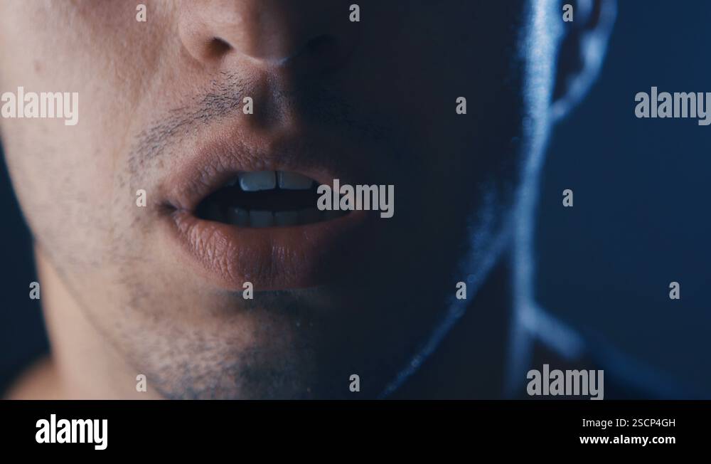 Close-up of a frightened man screaming with fear. Horror scene Stock ...