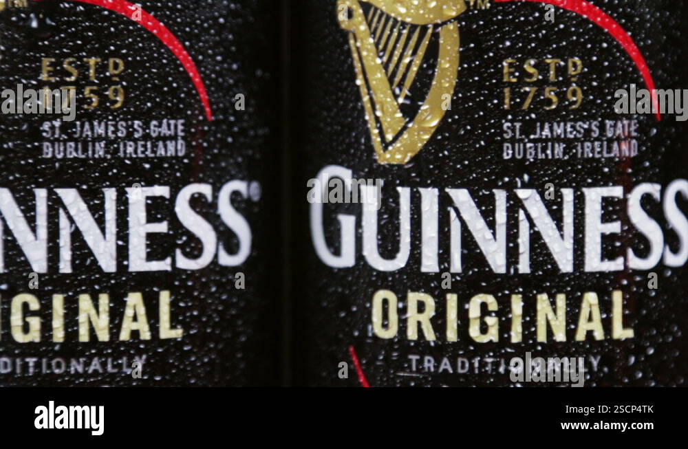 logo on aluminum cans of Guinness beer Stock Video Footage - Alamy