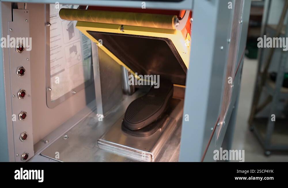 automated production of boots and leather clothes Stock Video Footage ...