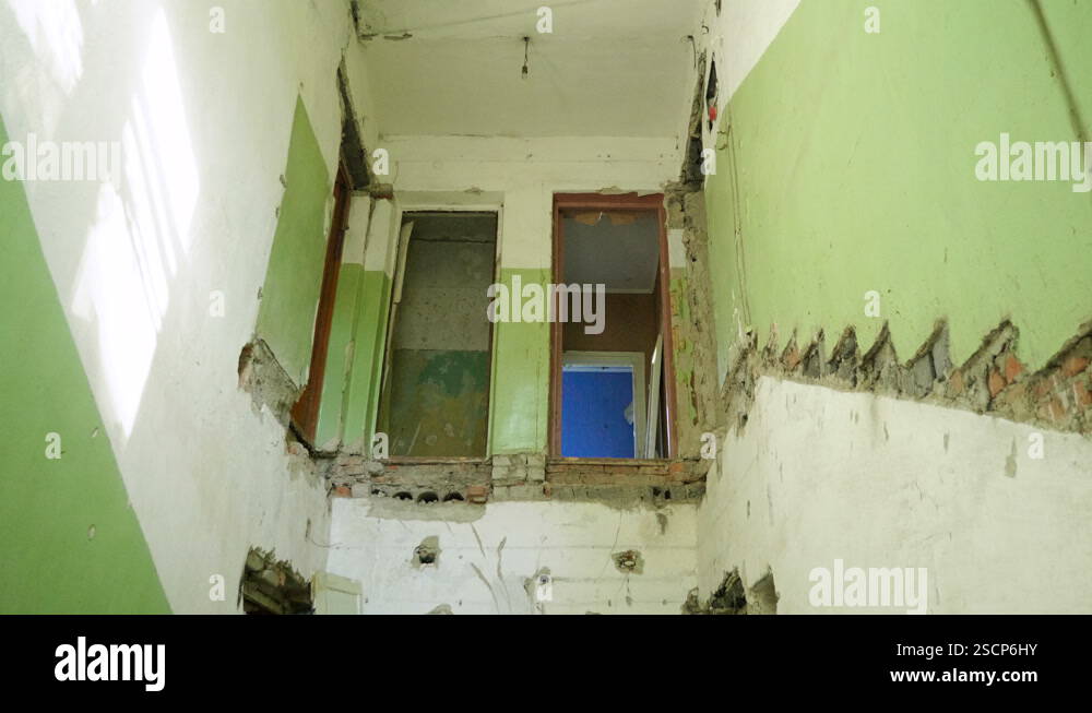 Condemned building. An empty old multi-storey house to be demolished ...