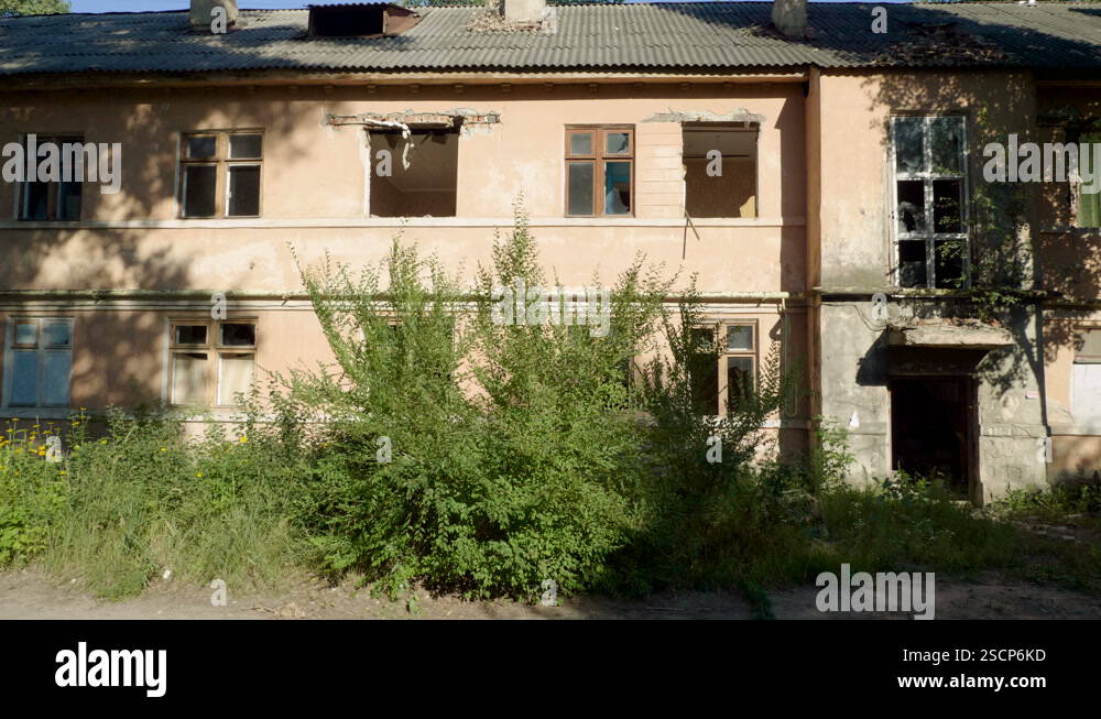 Condemned building. An empty old multi-storey house to be demolished ...