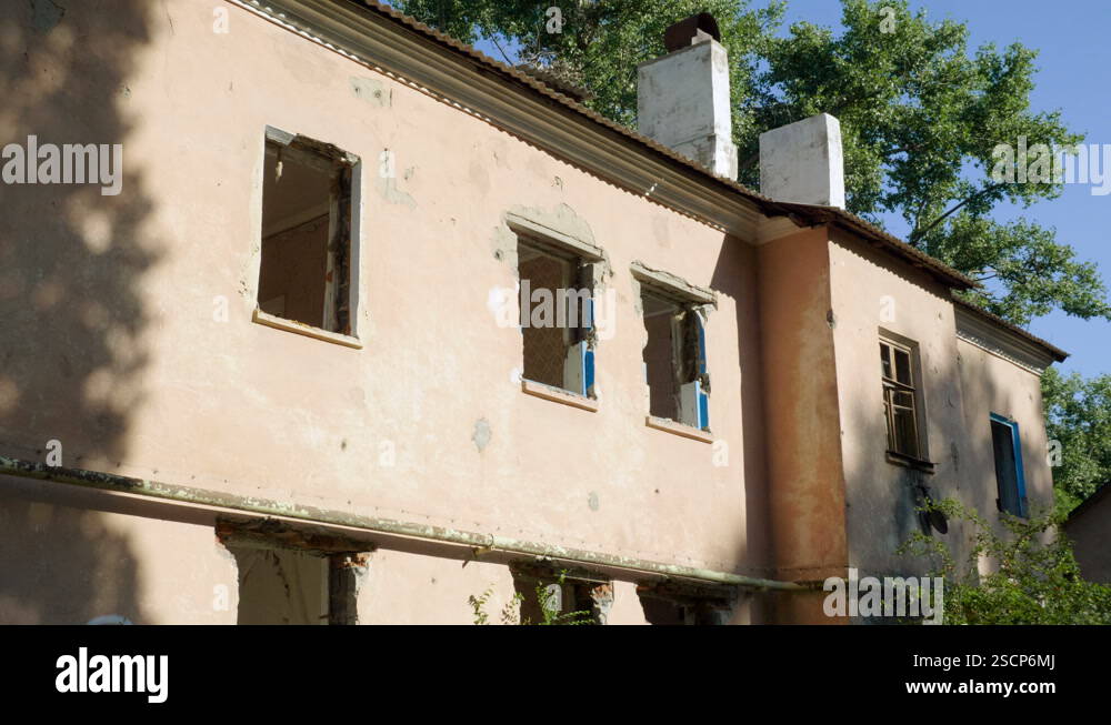 Condemned building. An empty old multi-storey house to be demolished ...
