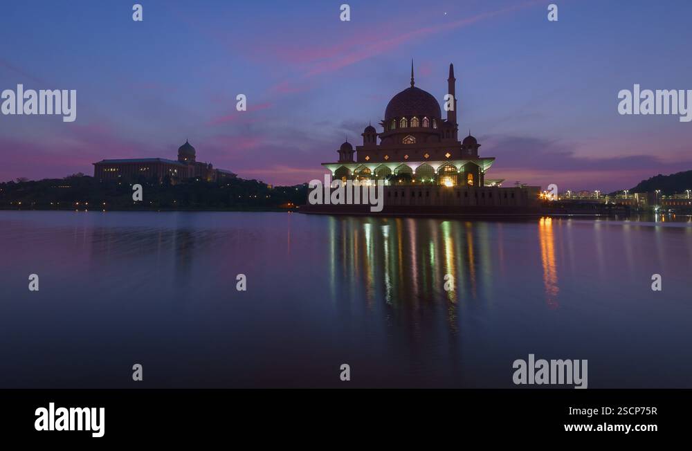 Beautiful Sunrise At Putrajaya Lake With Pink Sky And Reflection Of ...