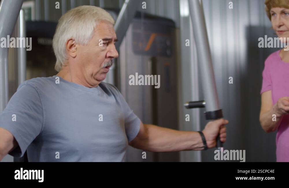 Old Man Exercising in Gym Stock Video Footage - Alamy