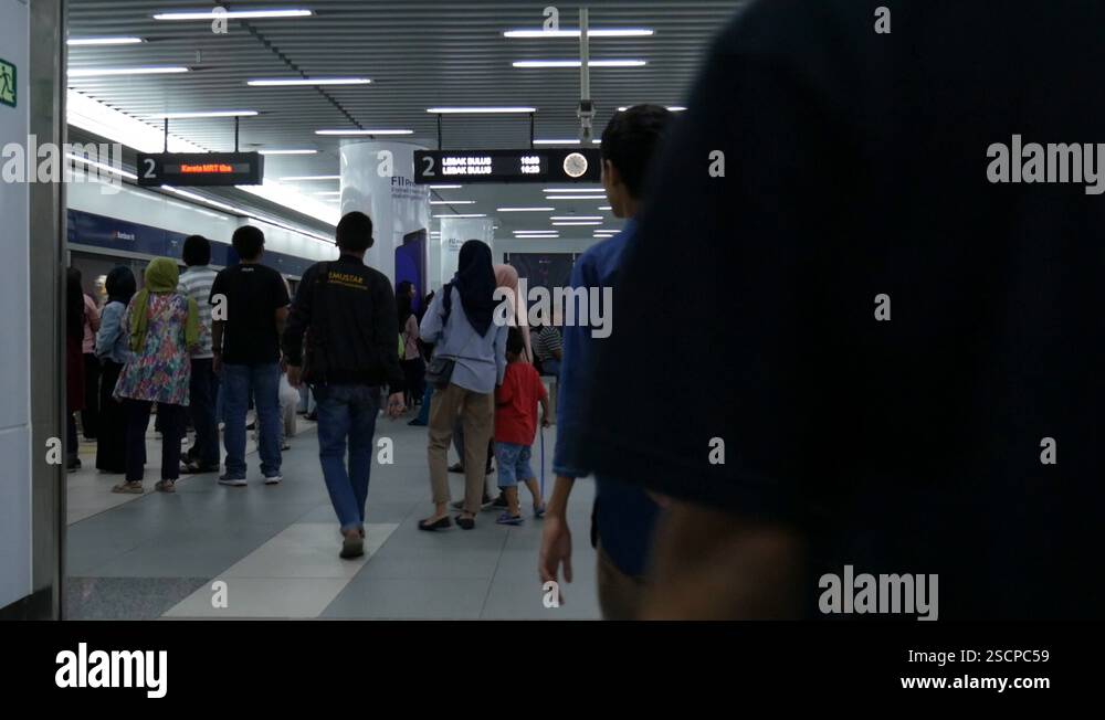 Jakarta MRT - Passenger on the Hallway Stock Video Footage - Alamy