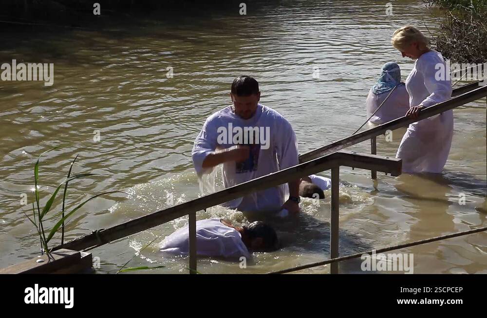 Pilgrims baptise in the Jordan River Holy Land Israel FULL HD Stock ...