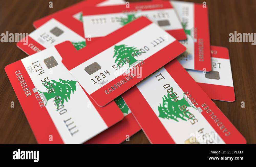 Pile of credit cards with flag of Lebanon. Lebanese banking system ...