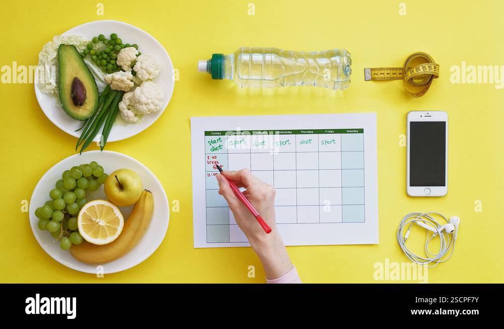 Keeping a fitness calendar.concept of healthy food, diet, top view ...