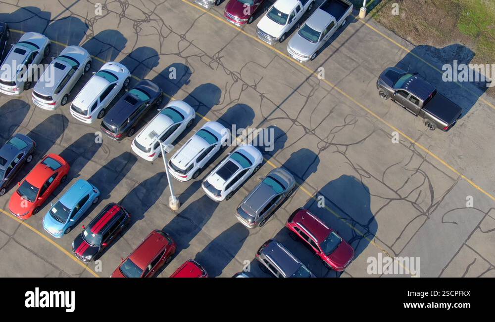 Car dealership lot with shiny new cars, trucks and SUVs Stock Video ...
