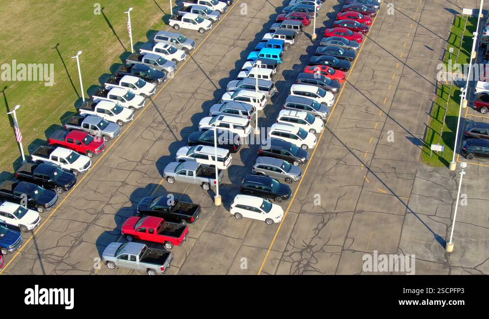 Car dealership lot with shiny new cars, trucks and SUVs Stock Video ...