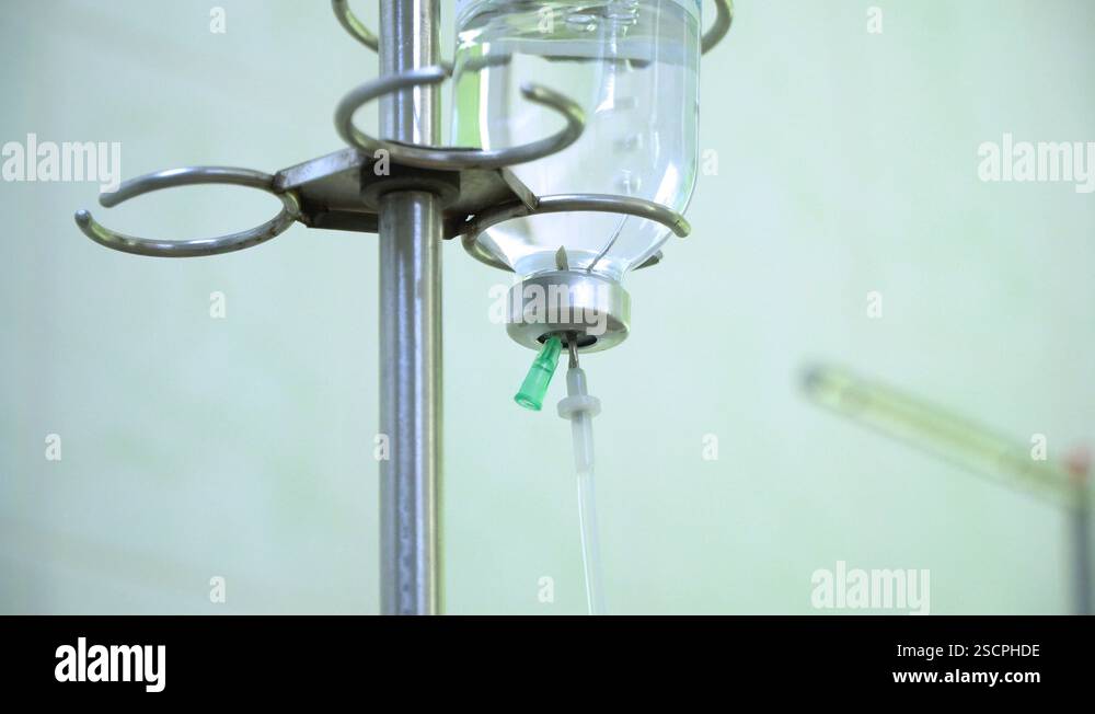 Intravenous injection. Infusion of the drug into a vein through an IV ...