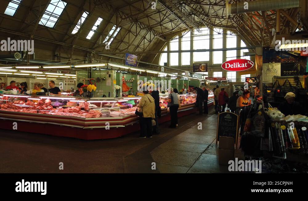 The central Market in Riga. Wide view of the meat hall. Pan left Stock ...