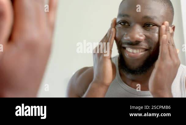 Applying facial cream african Stock Videos & Footage - HD and 4K Video ...