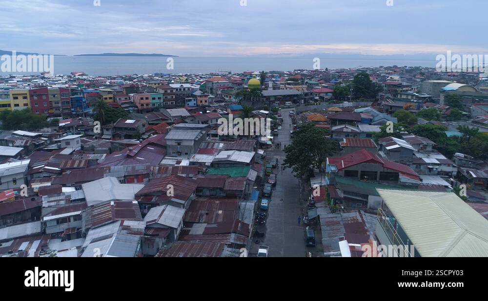 Aerial of rooftop houses and buildings in Davao City Stock Video ...