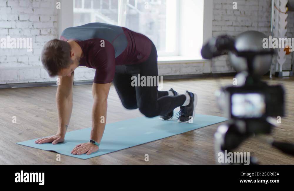 Gym Coach Explaining How to Do Exercise on Camera Stock Video Footage ...