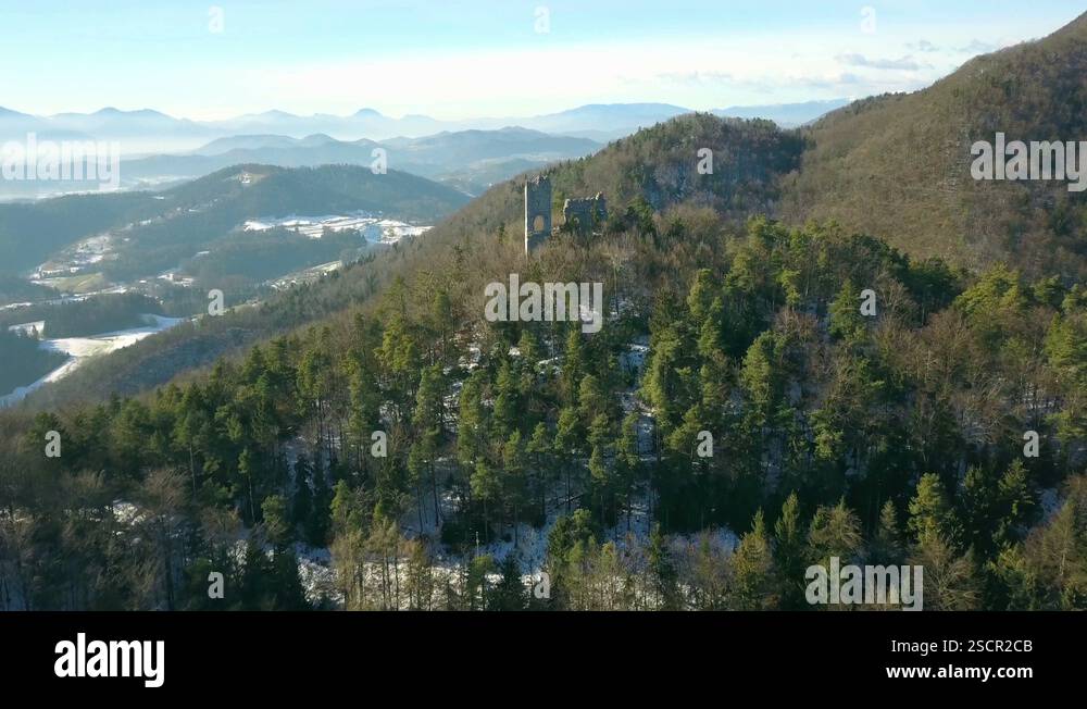 Aerial: Flying towards misterious ancient building ruins on top of the ...