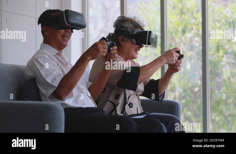 Senior couple uses VR which are fun virtual games Stock Video Footage ...
