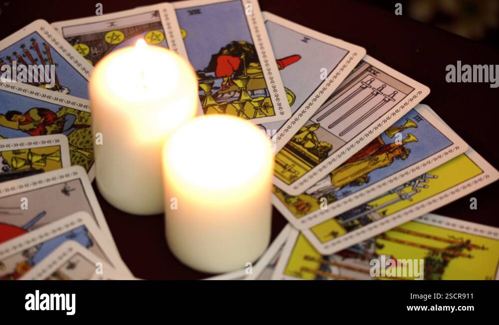 A rite for summoning spirits with ancient tarot cards on table. Occult ...