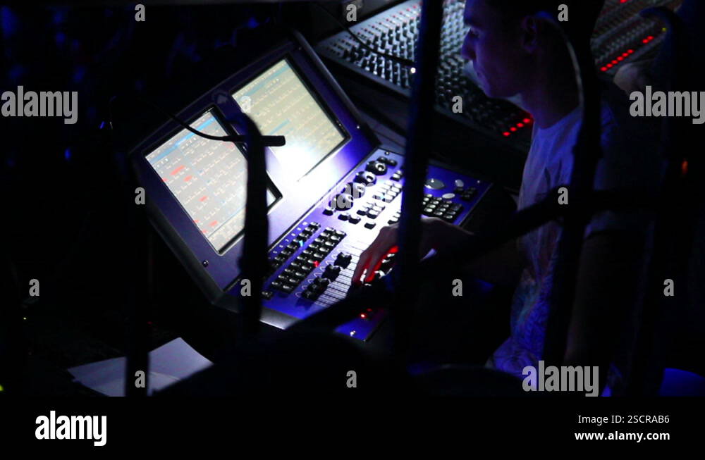 operator controls the sound and light effects Stock Video Footage - Alamy