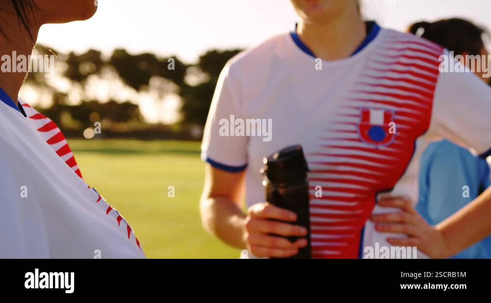 Female soccer team in break time talking on soccer field. 4k Stock ...