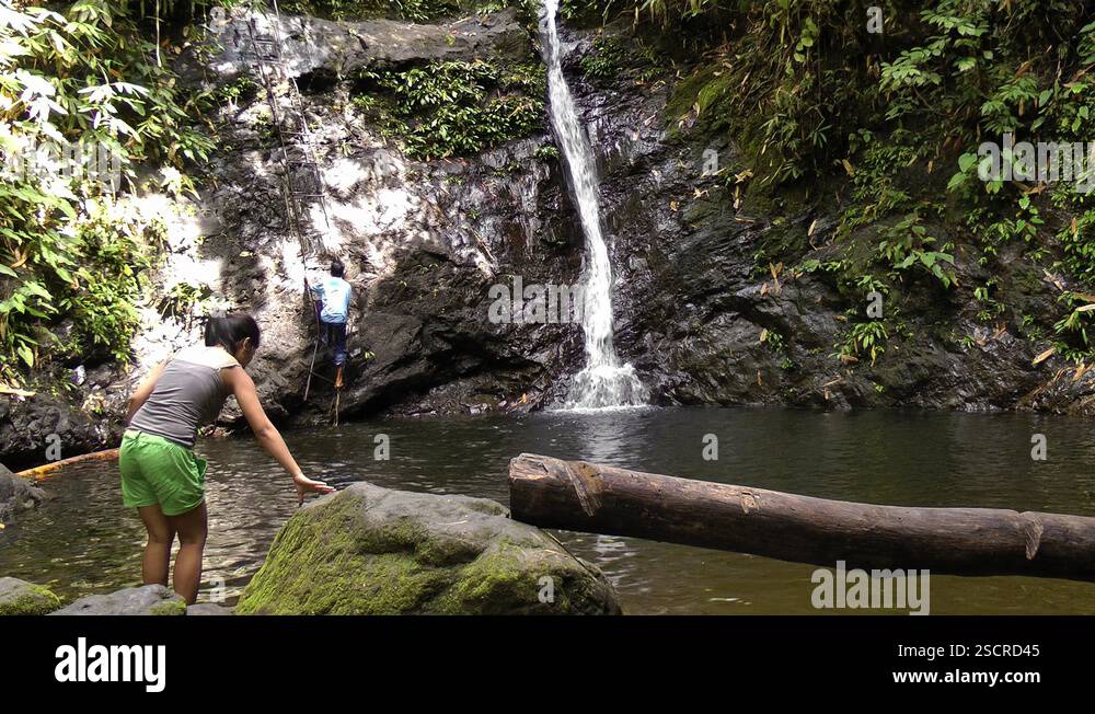 People Playing At An Waterfall, Philippines Stock Video Footage - Alamy