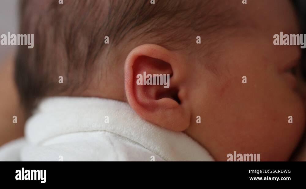Macro ear of newborn Stock Video Footage - Alamy