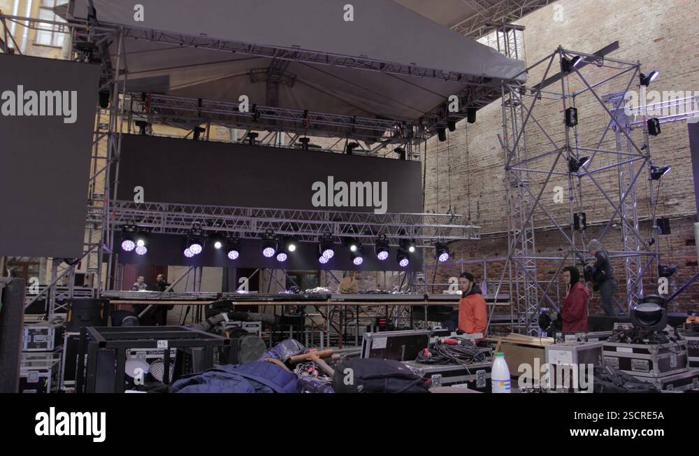 Time lapse: technical preparation of big stage with monitor for open ...