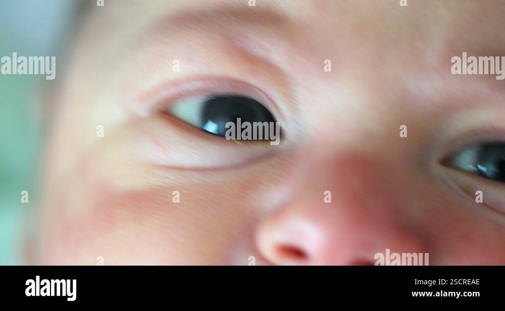 Newborn baby first day of life face Stock Video Footage - Alamy