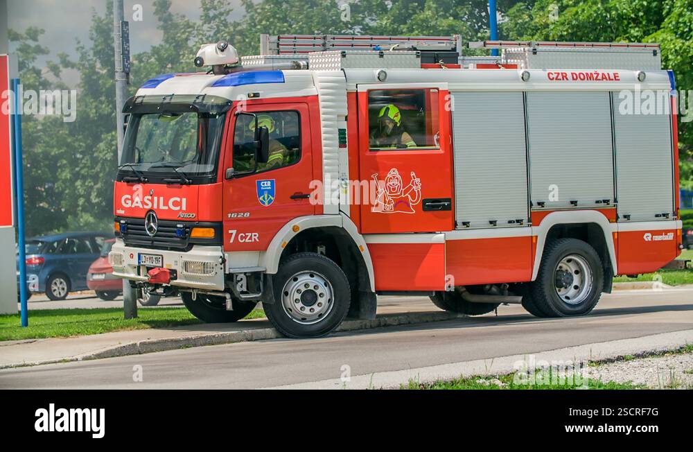 Firefighters are rushing out of a fire engine Stock Video Footage - Alamy