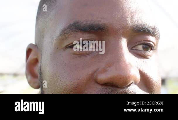 Close-up of person's face, showing thoughtful expression and gentle ...