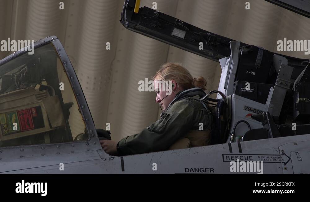 A-10 Thunderbolt II female pilot putting on flying helmet Stock Video ...