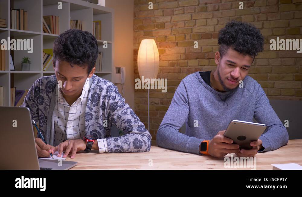 Two international student working Stock Videos & Footage - HD and 4K Video Clips - Alamy