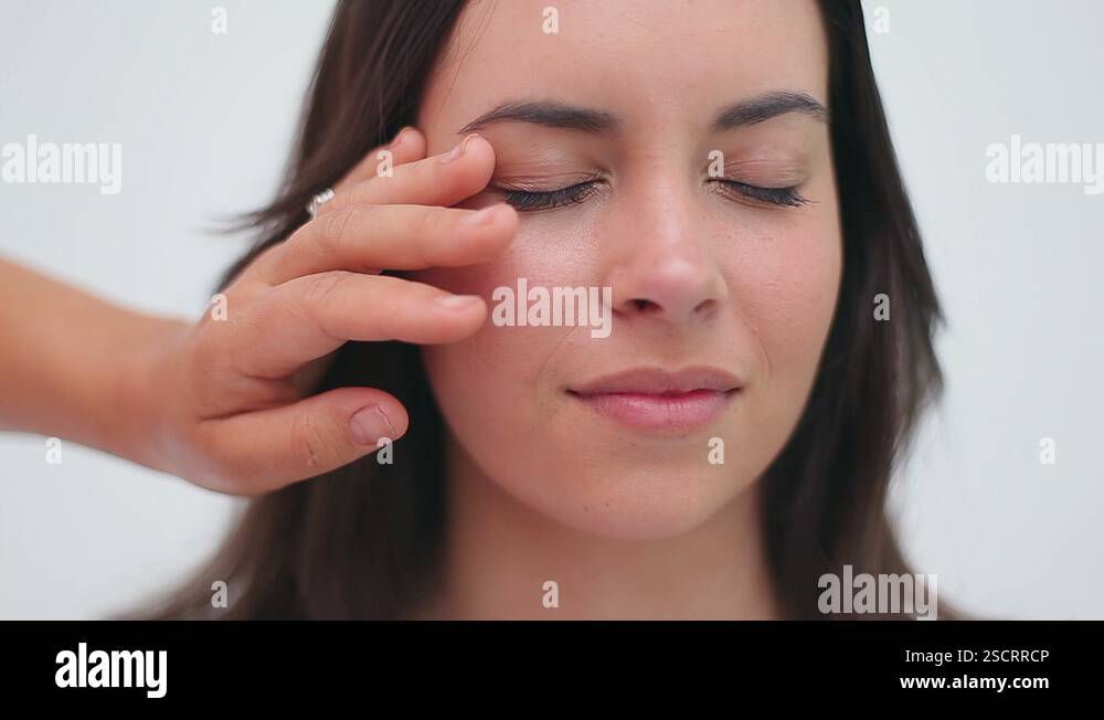 Hairdresser Using Hair Spray On A Brunette Woman Stock Video Footage