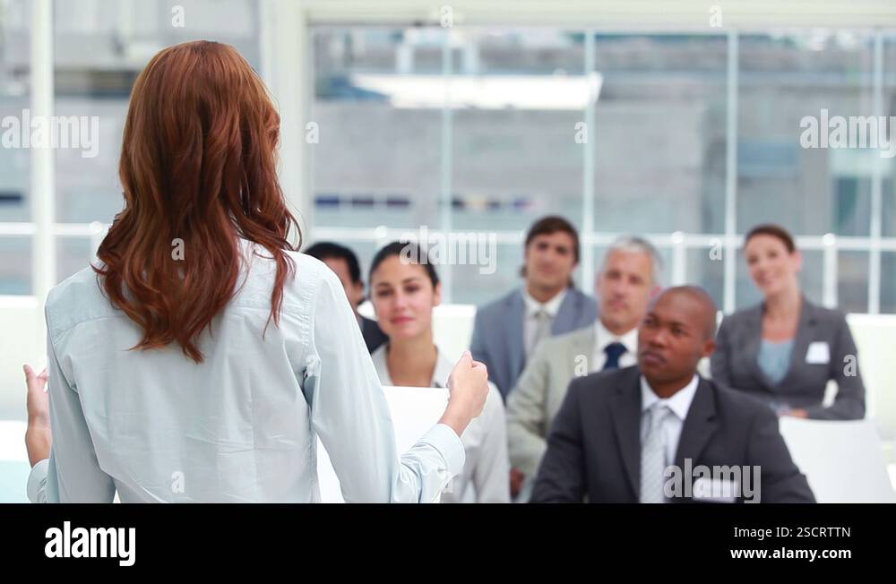 Audience clapping for a businesswoman Stock Video Footage - Alamy