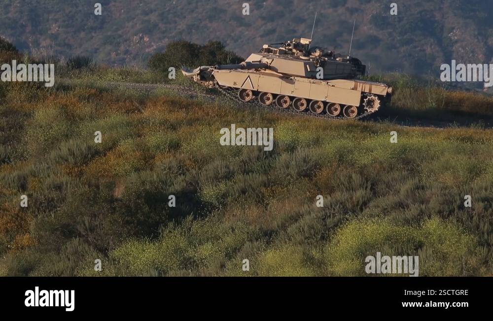 M1A1 Abrams battle tank aiming cannon Stock Video Footage - Alamy