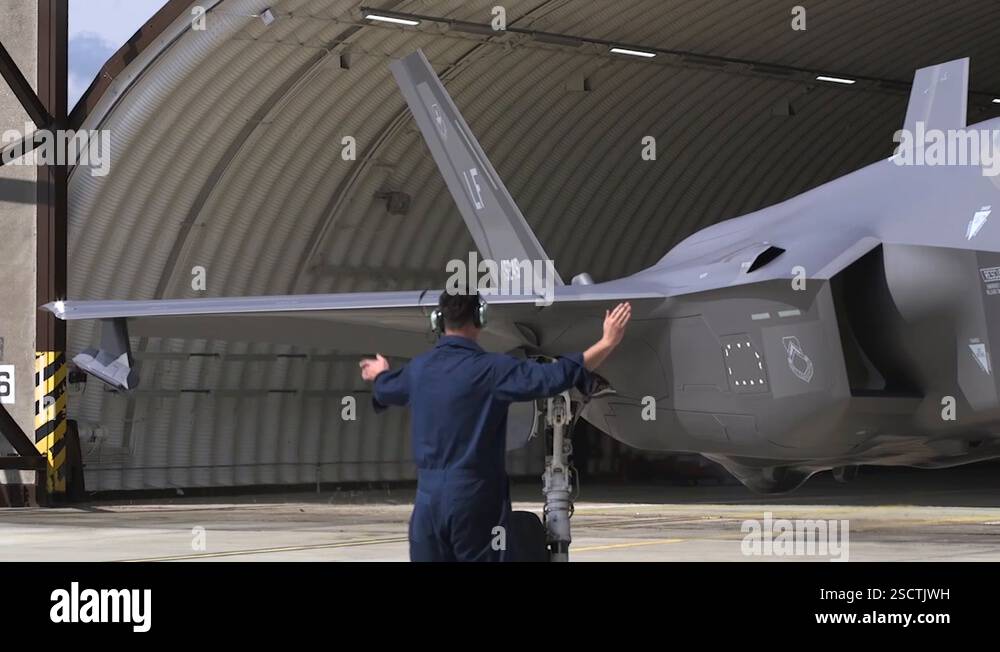 Aircraft marshaller directing F-35A Lightning II pilot Stock Video ...