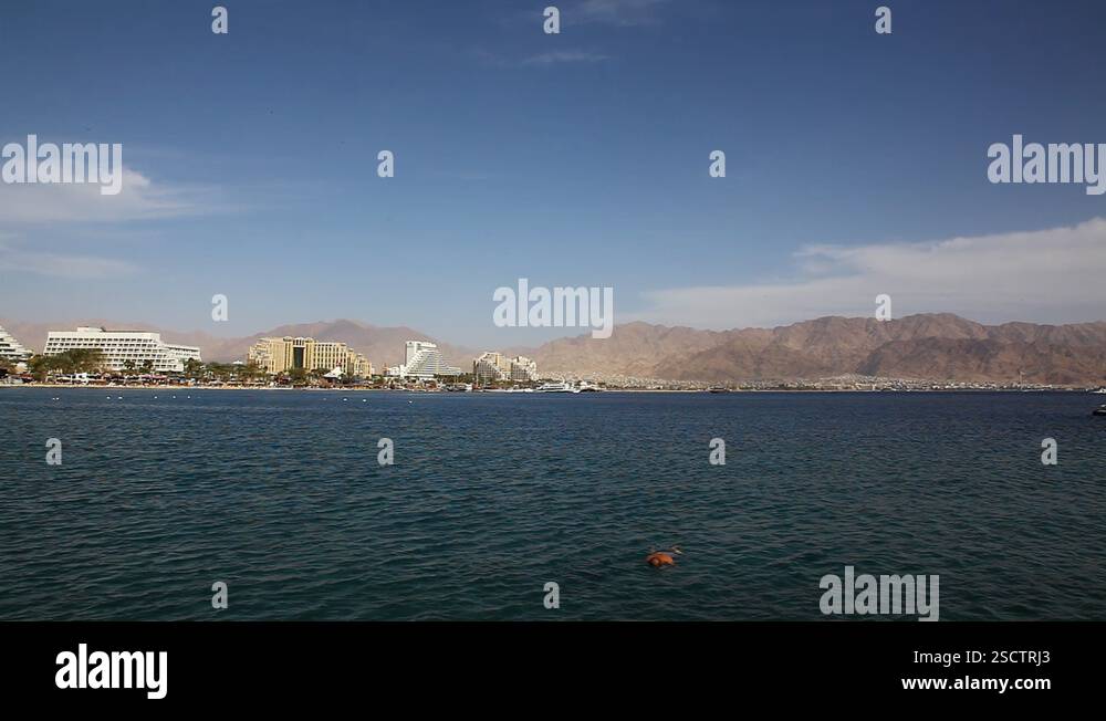 Skyline of Eilat: coastline, beach, hotels, promenade, mountains and ...