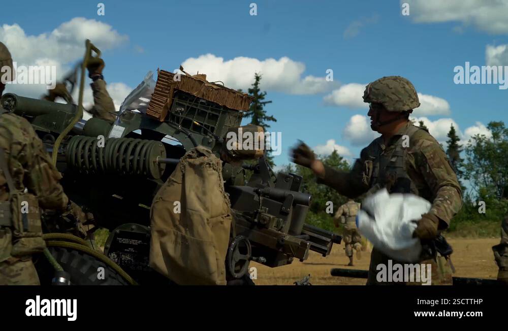 U.S. Army soldiers setting up M101 Howitzer during Red Flag Alaska ...