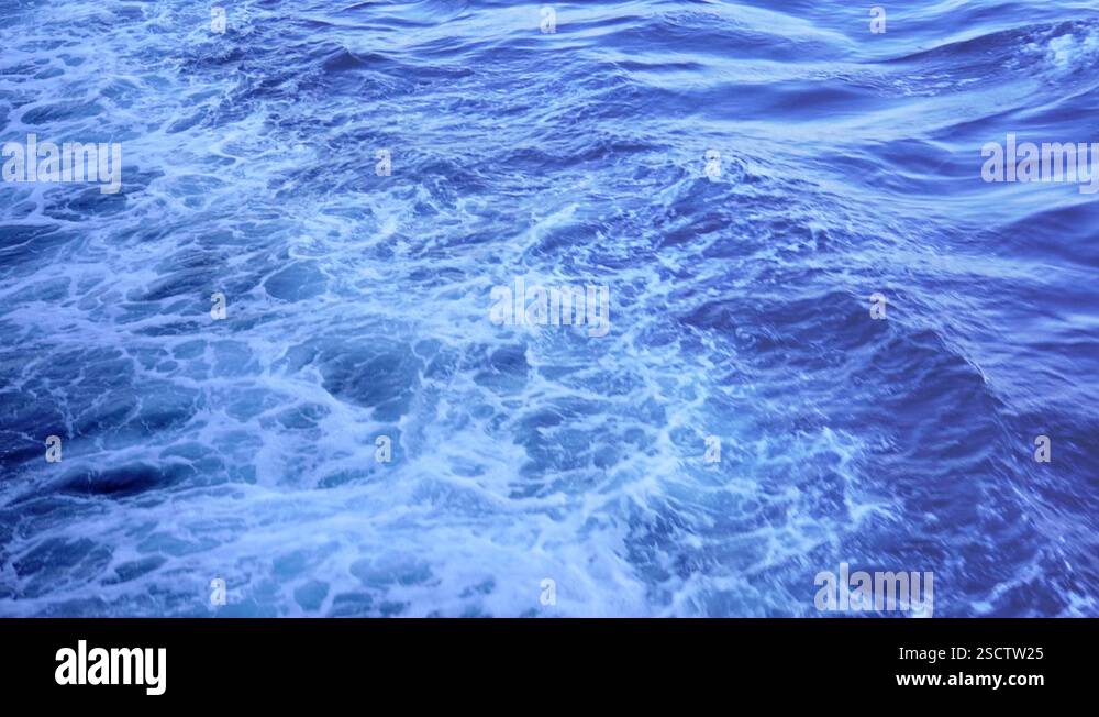 Ocean sea wave surface ripple, cruise ship water wake trace, slow ...