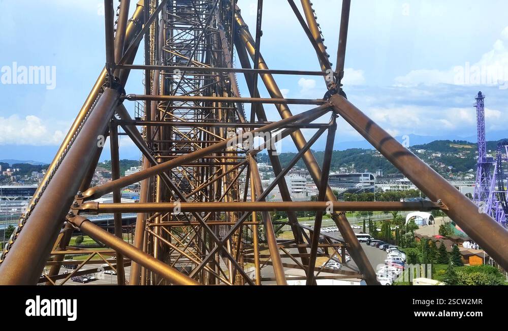 steel structure and the mechanism of the Ferris wheel against the blue ...