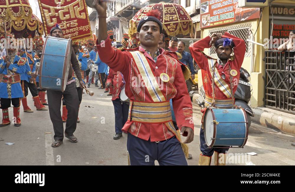 An Indian band member displaying his skills at playing with the mace ...