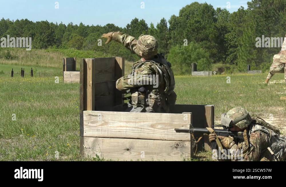 Soldier throwing hand grenade from cover wooden screen Stock Video ...