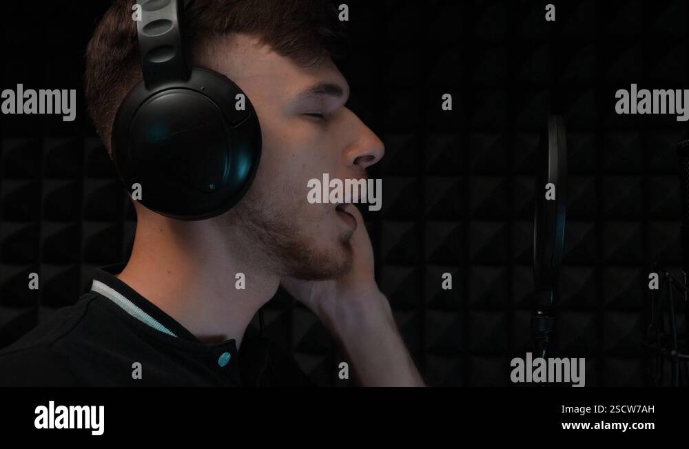 Romantic male artist emotionally singing love song. Young boy is ...