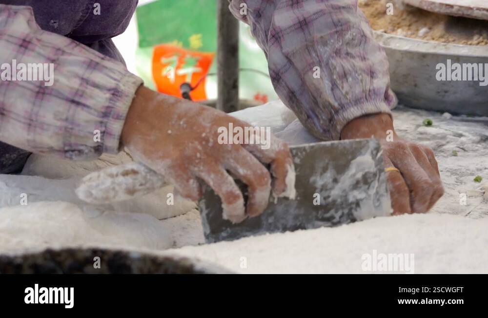 Woman Cutting Open the Dough with Meat Filling inside by Blade of ...