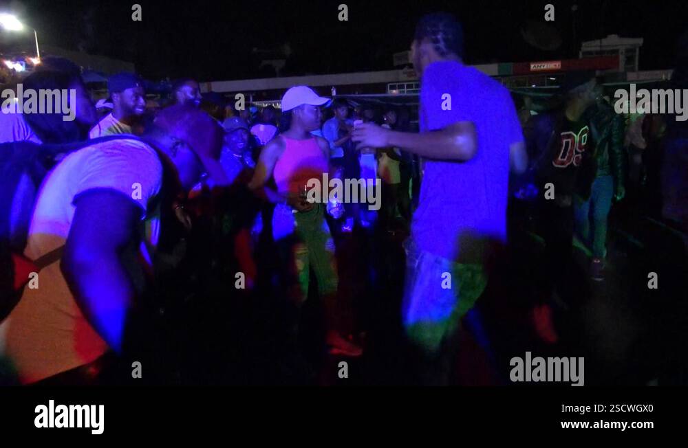 KINGSTON, JAMAICA : Scenery of outdoor street night club Stock Video ...