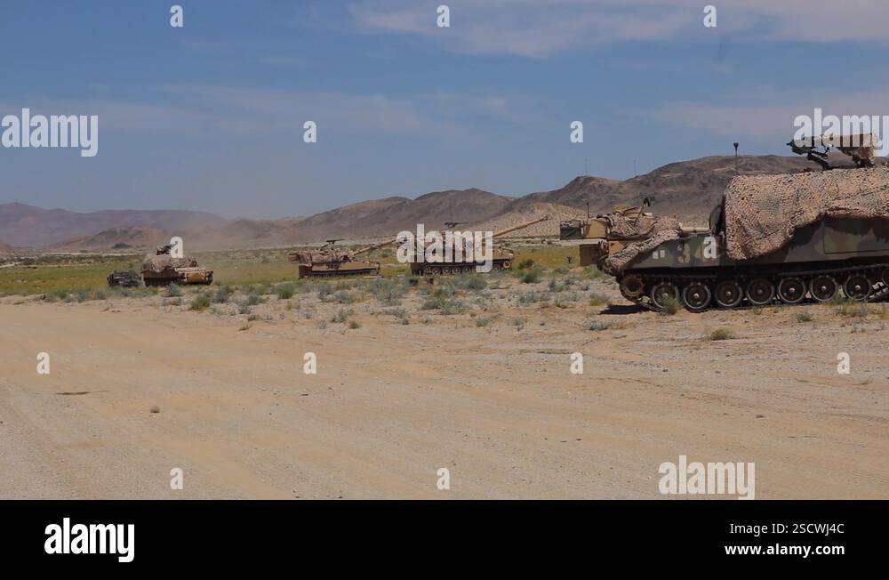 Army vehicles arriving at and parked in desert at Fort Irwin Stock ...