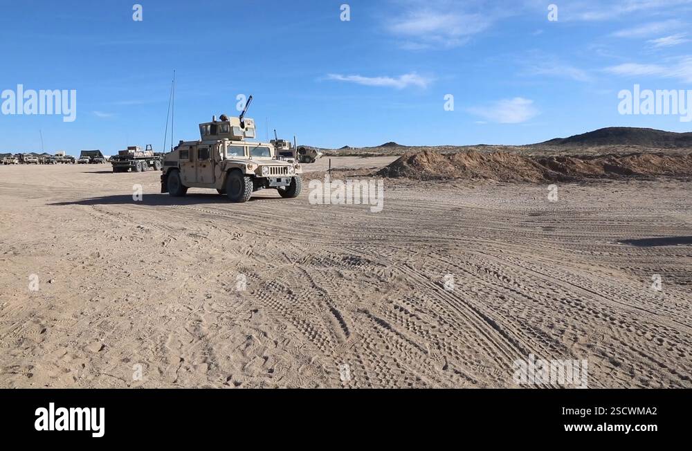 Armored Humvee travelling through desert for Operation Hickory Sting ...